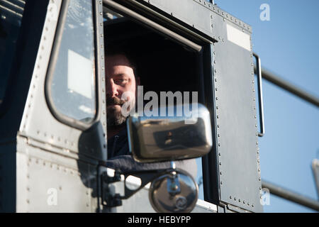 Mike Poole, 60th Aerial Port Squadron 60K loader operator, performs an ...