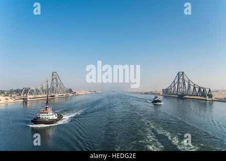 Tug Boat passes El Ferdan Railway Bridge in the Suez Canal near ...