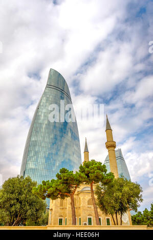 Flame towers and Sehidler Xiyabani mosque, Baku, Azerbaijan Stock Photo ...