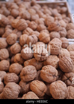 Detail of christmas tree with walnut on the table Stock Photo - Alamy