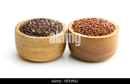 Black red white quinoa seeds in wooden spoon isolated on white ...