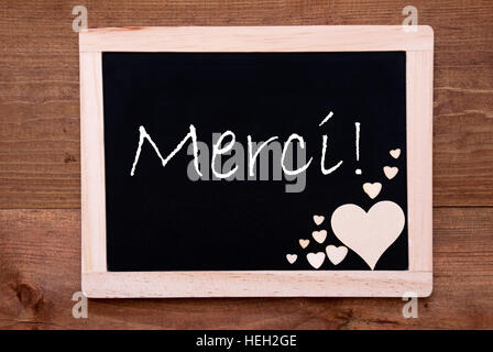 Blackboard With French Text Merci Means Thank You. Colorful Tulip ...