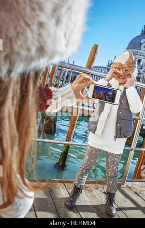 Another world vacation. smiling modern mother and daughter travellers ...