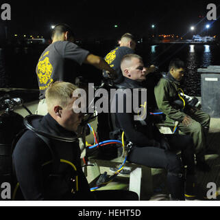 Members of the 7th Engineer Dive Detachment command team prepare their ...