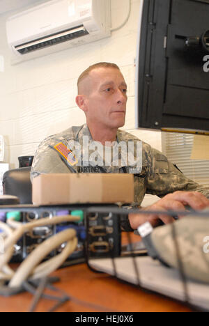 Sgt. 1st Class Jorge Martinez (center left), a native of Hato Rey ...