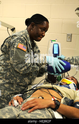 Medical personnel from the 7217th Medical Support Unit administer ...