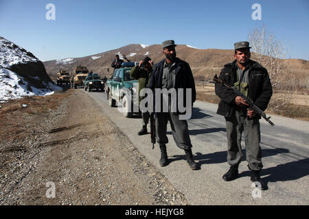 Afghan Local Police officers prepare to meet with a Ministry of ...
