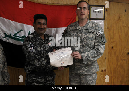 An Iraqi police officer graduates from a counter improvised explosive ...