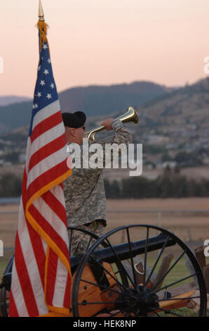 A Canadian Armed Forces bugler plays the Last Post during a ceremony ...