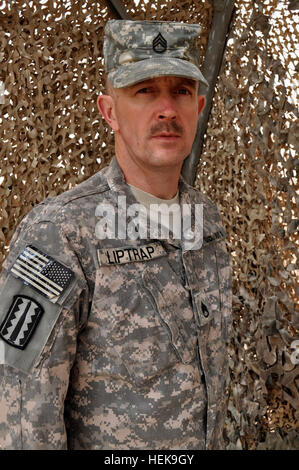 Iraqi Freedom veteran Army Staff Sgt. Carlos Labarca unclips his helmet ...