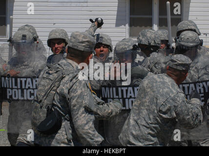 Members of the 40th Military Police Company, who convoyed from their ...