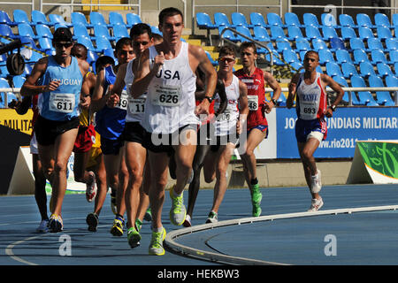 Runners compete in a semifinal of the men's 200-meters at the 2020 ...