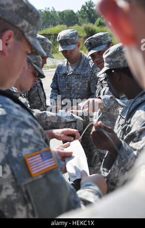 Soldiers of the 237th Engineer Company, 276th Engineer Battalion use ...