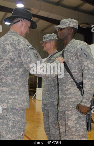 Col. Paul Calvert, left, commander of 2nd Advise and Assist Brigade ...