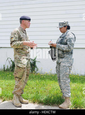 First Lt. Naomy Santiago interviews Lt. Col. Paul Smith, a liaison ...