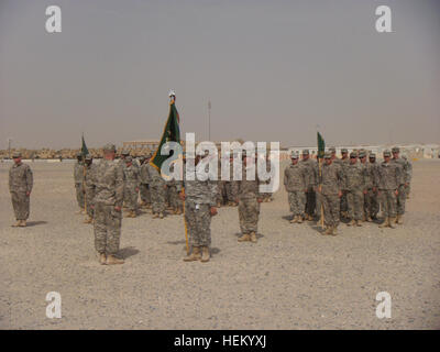 Soldiers with the 34th Military Police Company gather to discuss the ...