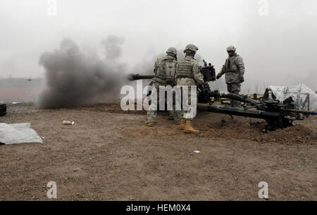 Section 1, Battery A, 2nd Battalion, 320th Field Artillery, 1st Brigade Combat Team, fires a 105 ...