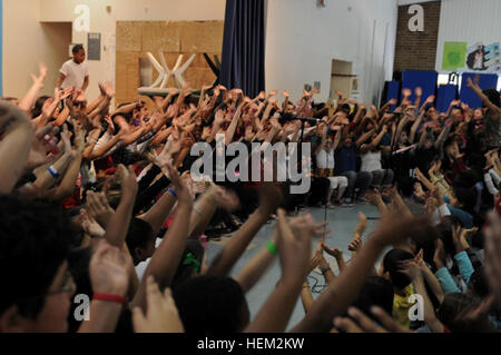Students at Tyee Park Elementary School surround Tracey Lundquist, a ...