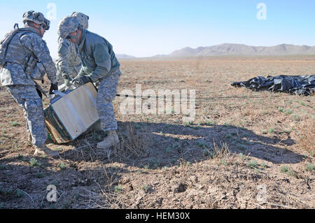 Soldiers from 501st Brigade Support Battalion carry a "wounded" comrade ...