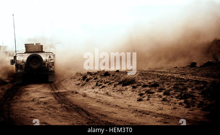 POHAKULOA TRAINING AREA, Hawaii -- A humvee from the 57th Military ...