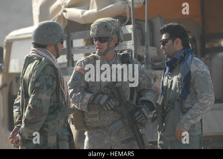 Maj. Brian Roeder (L), a member of Security Forces Advise and Assist ...