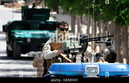 A member of Australia's Special Operations Task Group (SOTG) provides ...