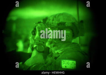 A member of Australia's Special Operations Task Group (SOTG) provides ...