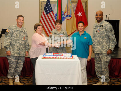 Major General Flem Walker Jr. (center), the commanding general for the ...