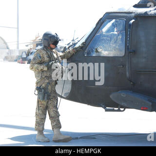 Sgt. 1st Class Steve Shirk, a UH-60 Black Hawk helicopter crew chief ...