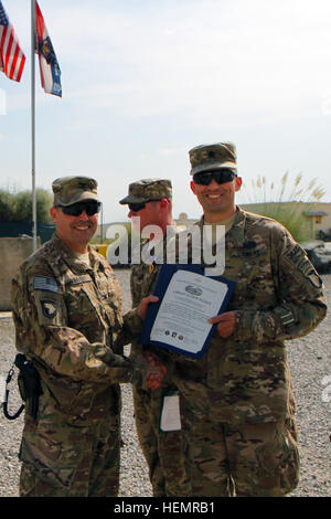 U.S. Army Lt. Col. Larry R. Moore receives the Distinguished Order of ...