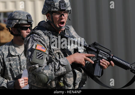 Sgt. 1st Class Aaron Beckman, representing U.S. Army Europe, reacts to ...