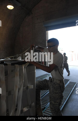 A parachute rigger with 861st Quartermaster Company, a reserve unit ...