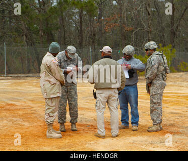 Brigade Logistics Support Team (BLST) Maj. Jason Cole and Mike Ahrens ...