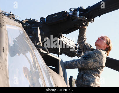 Capt Megan Howell, an AH-64 Apache helicopter pilot from 1st Attack ...