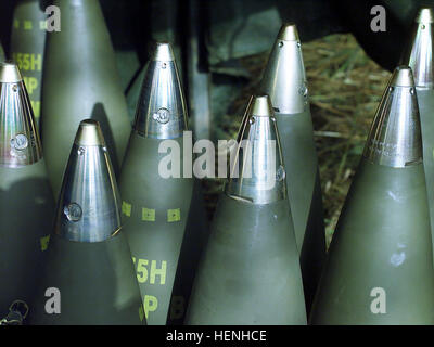 Several M107 155mm High Explosive Projectiles with fused adapter, are ...