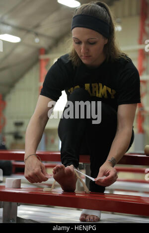 Army veteran Staff Sgt. Randi Hobson dives for a ball against Denmark ...