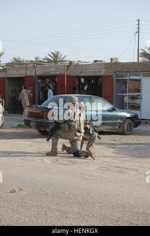 Sgt. Michael Rios, a native of Sebastian, Texas, greets a young girl ...