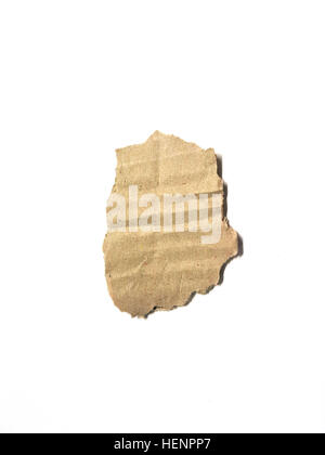 Cardboard piece isolated on white background. Top view of torn ...