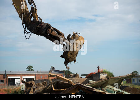The 5000+ PSI demolition shear jaws of a tracked hydraulic excavator ...