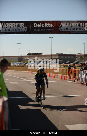 Competitors in the Women’s Open Cycle prepare to cross the finish line ...