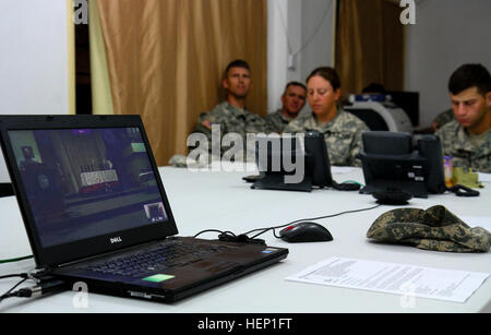 Division Chaplain (Lt. Col.) David Bowlus hugs his son Andrew, while ...