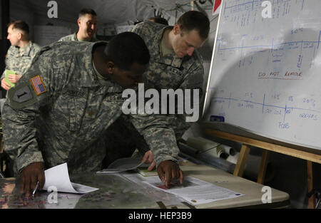 Fire support officers from the 2nd Cavalry Regiment prepare a course of ...
