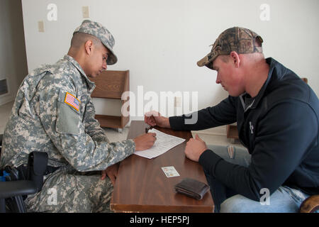 Spc. Brian Coates, a military police officer assigned to the 218th ...
