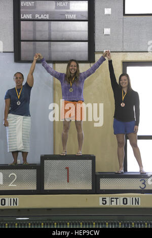 Army veteran Staff Sgt. Randi Hobson dives for a ball against Denmark ...