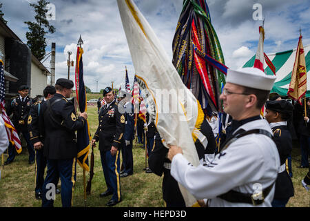 The Joint Military Color Guard prepare to display the colors during ...