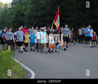 Lt. Col. Caprissa Brown-Slade (left) presents guest speaker Sgt. Asi ...