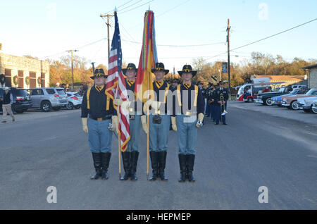 The 1st Cavalry Division Color Guard leads the Children's Christmas ...