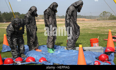 U.S. Soldiers assigned to the 21st Chemical Company, perform self ...