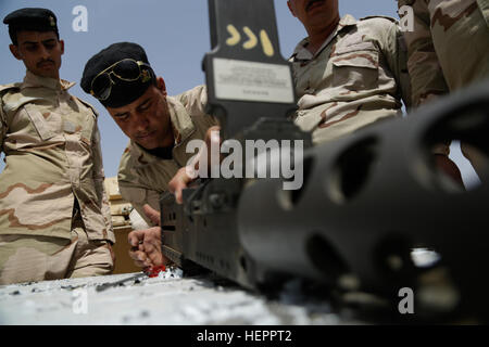 Iraqi soldiers of the 35th Brigade practice disassembly and maintenance ...
