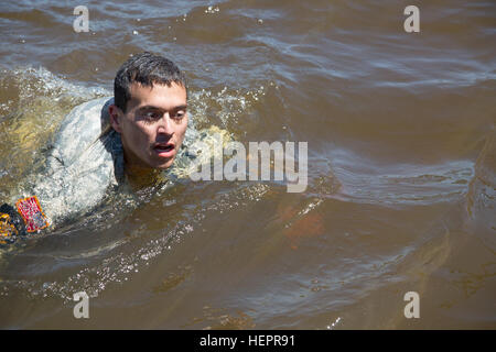 A U.S. Army Ranger swims in Victory Pond during the Best Ranger ...